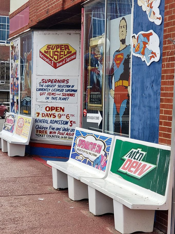 Custom benches outside invite weary travelers to rest while contemplating a visit to the "largest collection of Superman items on this planet."