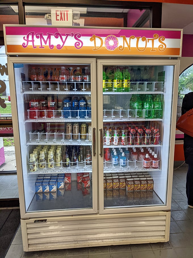 Hydration station for the sugar journey ahead. Amy's keeps the beverages cold and the donuts fresh—priorities firmly in order.