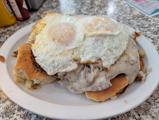 Biscuits and gravy topped with a sunny-side-up egg—the breakfast equivalent of a warm hug from your favorite grandparent.