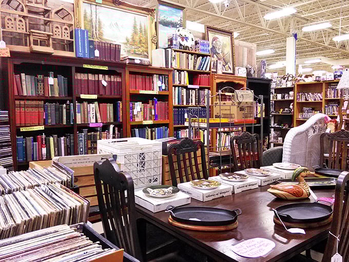 A bibliophile's dream corner where leather-bound classics share space with vintage vinyl. That table has hosted more stories than a librarian's book club.