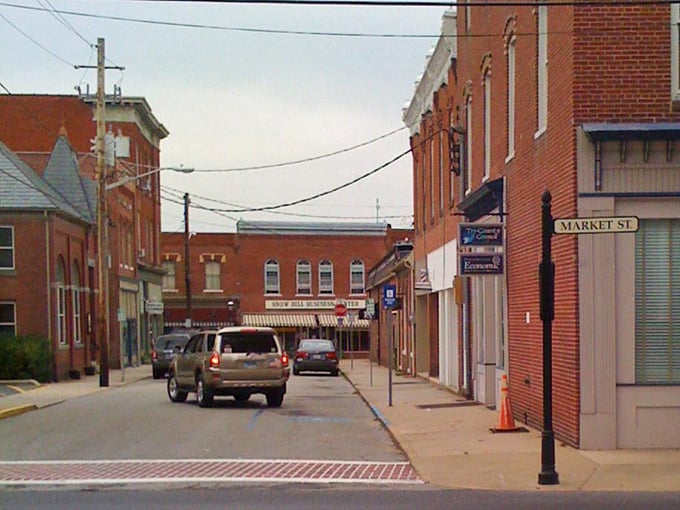 Market Street's brick buildings and vintage storefronts create a timeless backdrop for everyday life in a town that values its architectural heritage.