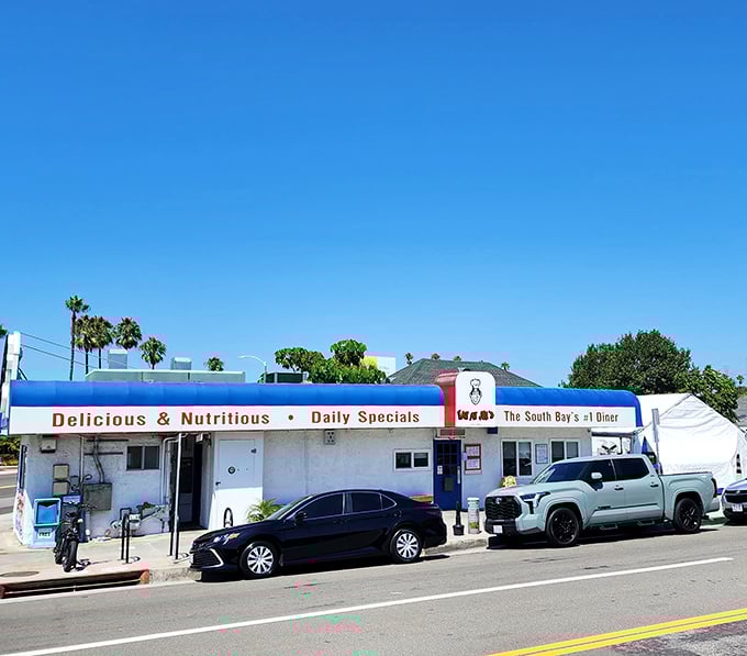 From the street, it looks unassuming, but locals know this blue-awninged building houses breakfast treasures worth their weight in golden hash browns.
