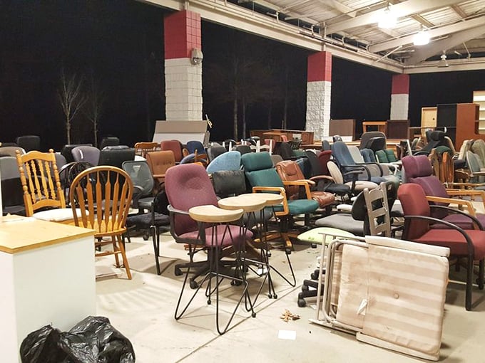 Office chairs and dining seats in a jumble—a silent congregation of seating options having their annual convention.