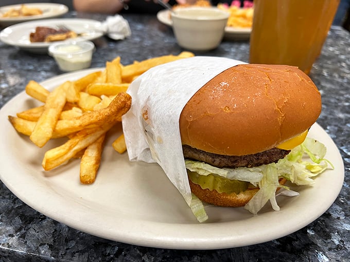 The cheeseburger—America's most perfect invention alongside jazz and the road trip. Simple, honest, and utterly satisfying.