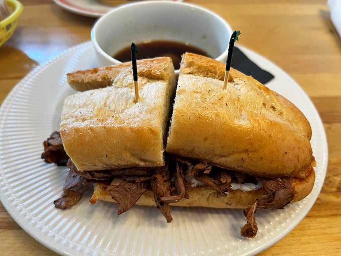 The French dip that launched a thousand napkins—tender meat, pillowy bread, and that magical dipping sauce that ties it all together.