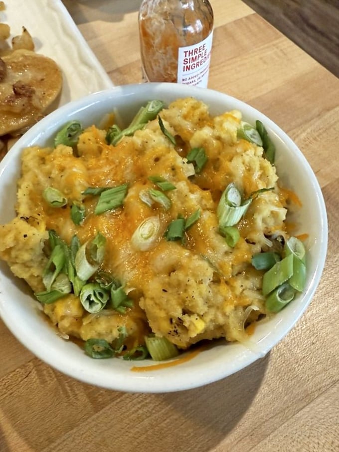 Not your grandmother's grits (unless she was a culinary genius). Cheesy, spicy, and topped with scallions—Southern comfort with Pennsylvania flair.