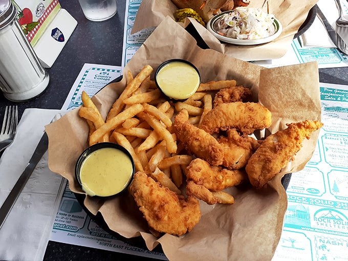 Chicken tenders that actually taste like chicken—a revolutionary concept paired with fries that demand to be dunked.