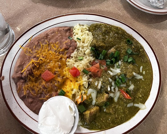 Chile verde that transports you straight to abuela's kitchen, with rice and beans that play perfect supporting roles.