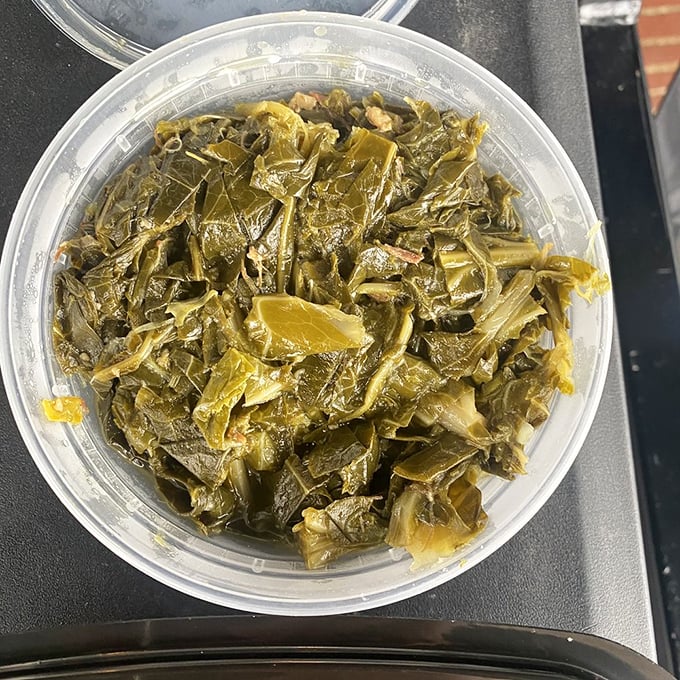Collard greens that have been simmering since yesterday, absorbing flavors that can't be rushed. Vegetable candy for the Southern soul.