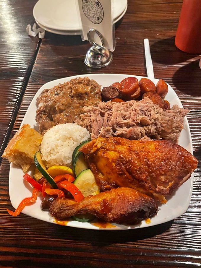 The sampler plate that solves all decision-making anxiety—a little of everything means you don't have to choose between coconut beef, chicken, and pulled pork.