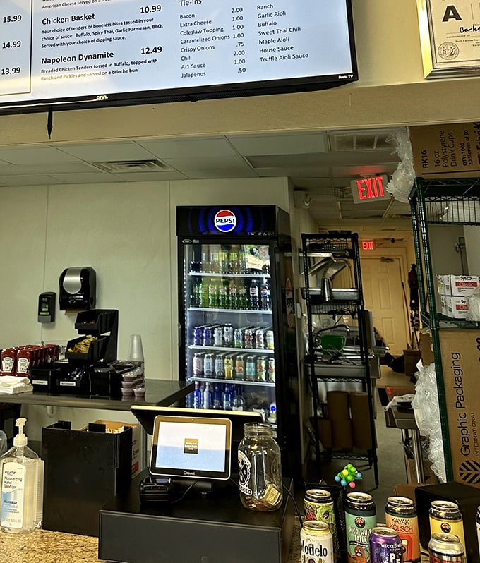 Behind this counter, burger magic happens. The drink selection provides the perfect accompaniment to your smashed masterpiece.
