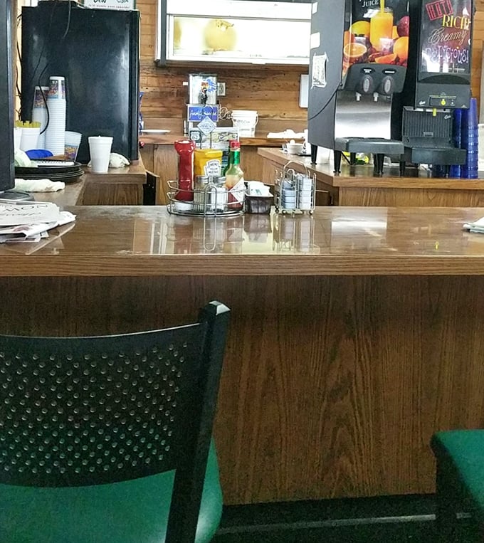 The counter—where solo diners find community, coffee cups are never empty, and the world's problems are solved one pancake at a time.