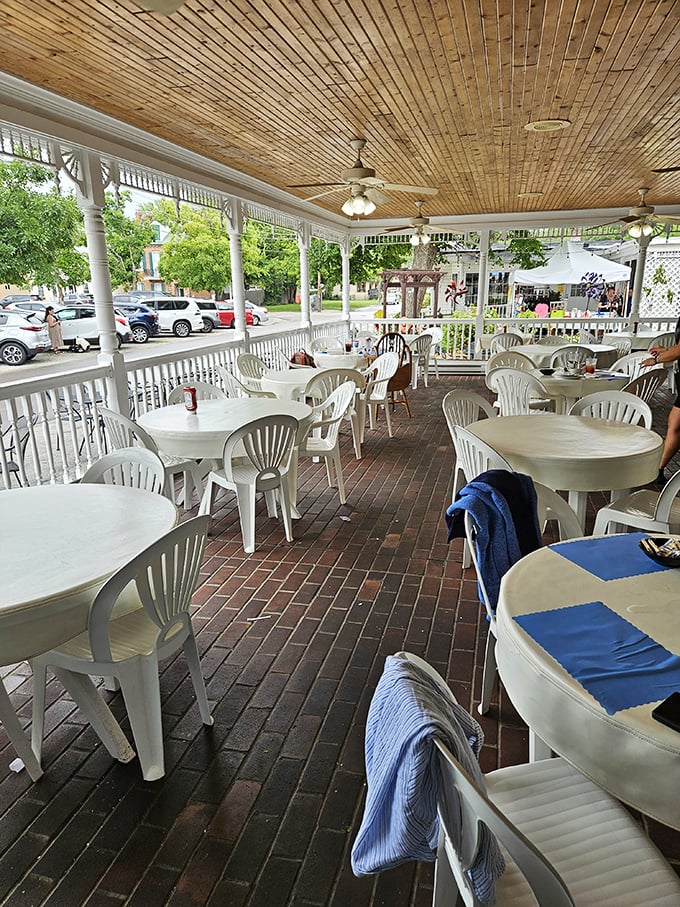The covered porch offers al fresco dining with small-town charm—perfect for people-watching while debating whether to order a second slice of pie.