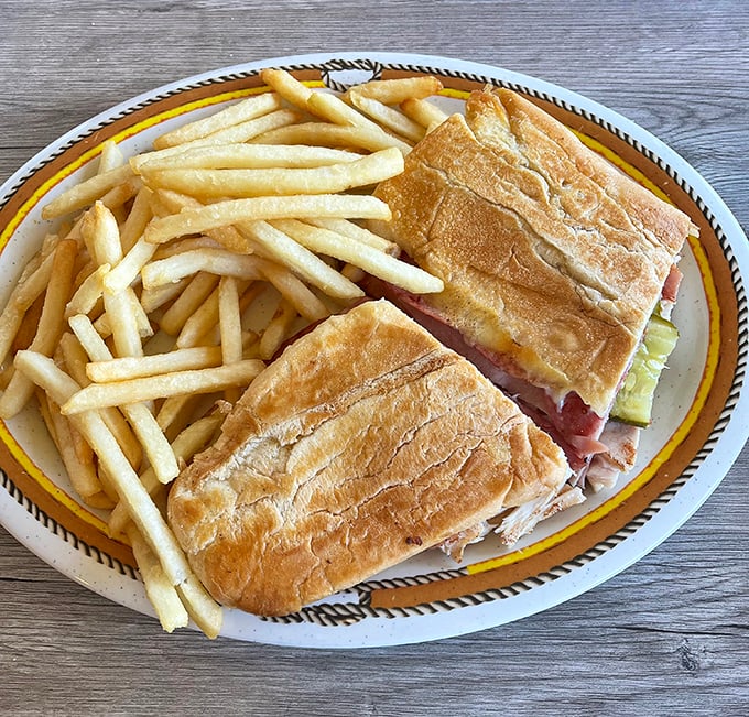 This Cuban sandwich with perfectly crisp fries could broker peace between nations – or at least between hungry family members.