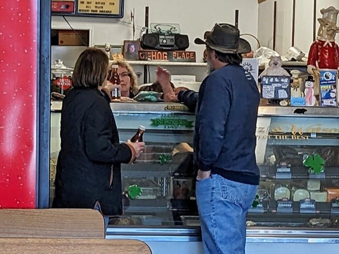 The line forms with purpose – these customers aren't just waiting for food; they're participating in a delicious Emmaus tradition.