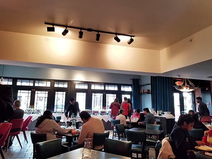 Lunchtime at Aarzu hums with conversation and clinking glasses—a symphony of satisfaction conducted by servers bearing trays of aromatic treasures.