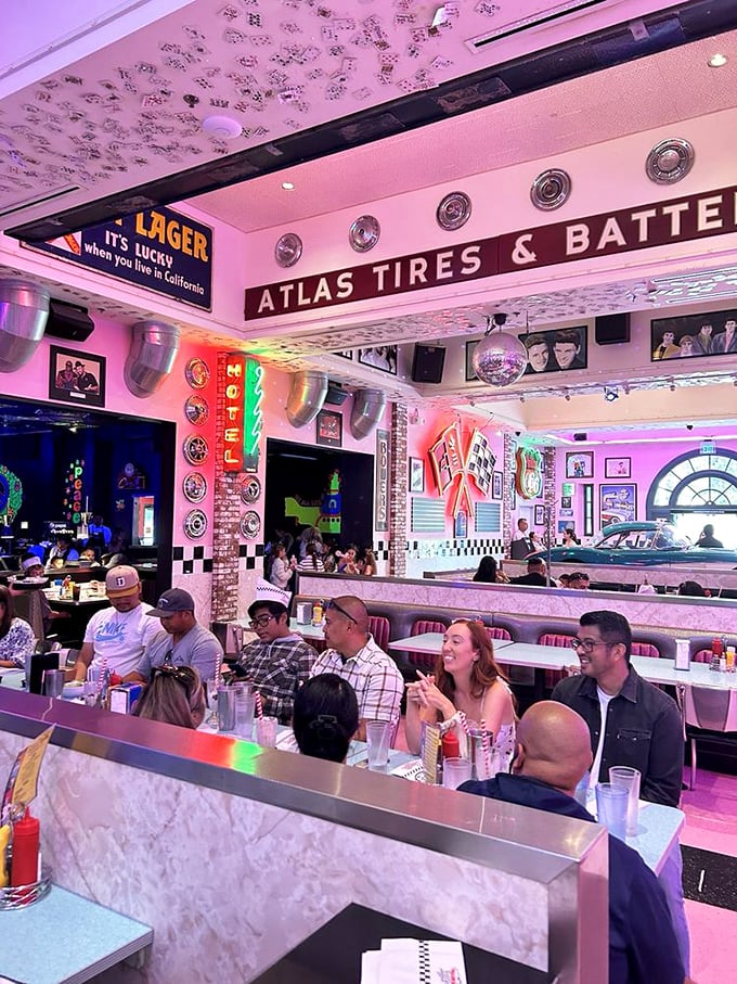 Smiles, stories, and shared plates fill the booths—this retro diner shows that nostalgia lives in the people as much as the neon glow.