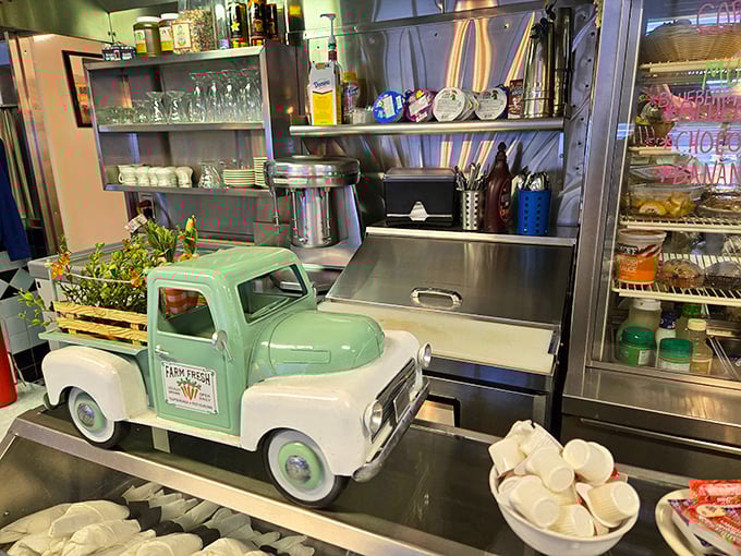 Vintage charm in every corner—this little farm truck decoration speaks volumes about the diner's commitment to nostalgic Americana.
