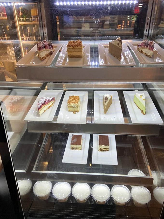 The dessert case showcases a tempting array of sweet finales—each slice promising the perfect ending to your North African feast.