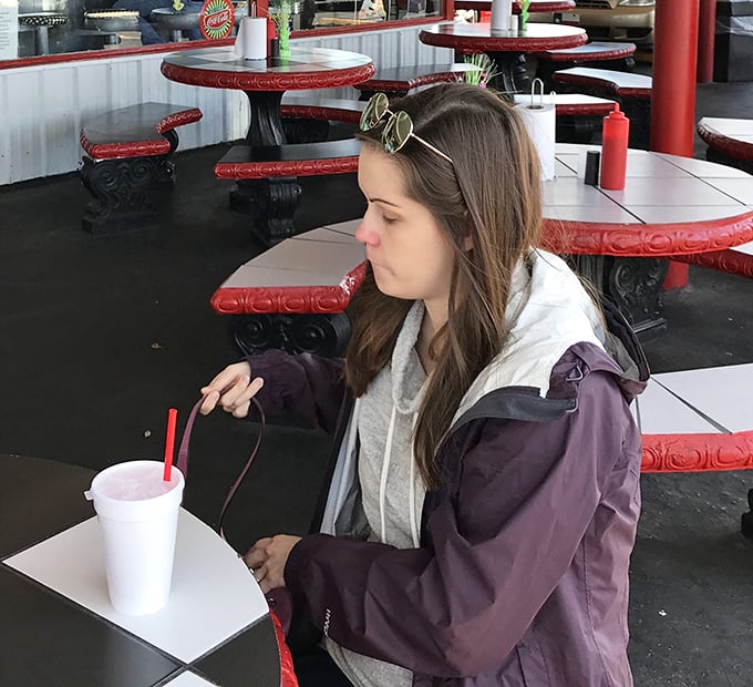 A quiet moment in a place designed for joyful noise. Even empty, these tables hold the echoes of decades of laughter and satisfied sighs.