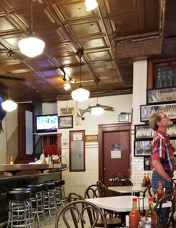 The pressed tin ceiling and vintage lighting fixtures have witnessed generations of Pittsburghers bonding over perfectly fried seafood.