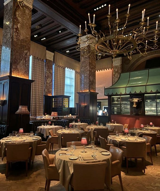 Tables arranged with mathematical precision under soaring ceilings—dining room or cathedral to carnivorous pleasures? Both.