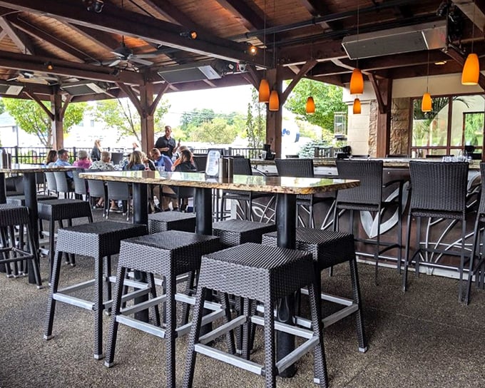 The outdoor dining area combines rustic beams with modern seating—Pennsylvania fresh air included at no extra charge. Al fresco perfection for those perfect evenings.