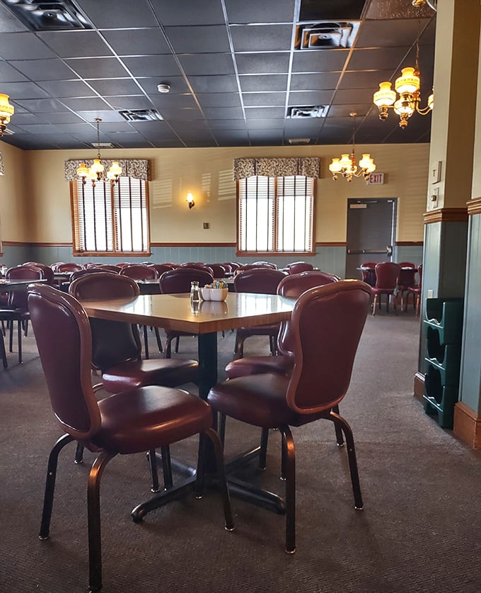 Burgundy chairs and warm lighting create the perfect setting for the serious business of enjoying food that makes you close your eyes when you take the first bite.