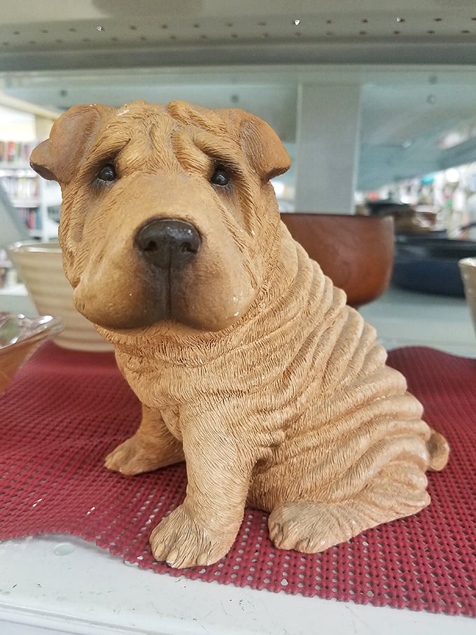 This shar-pei figurine stares soulfully, silently judging your other purchases while hoping to find a spot on your knickknack shelf.