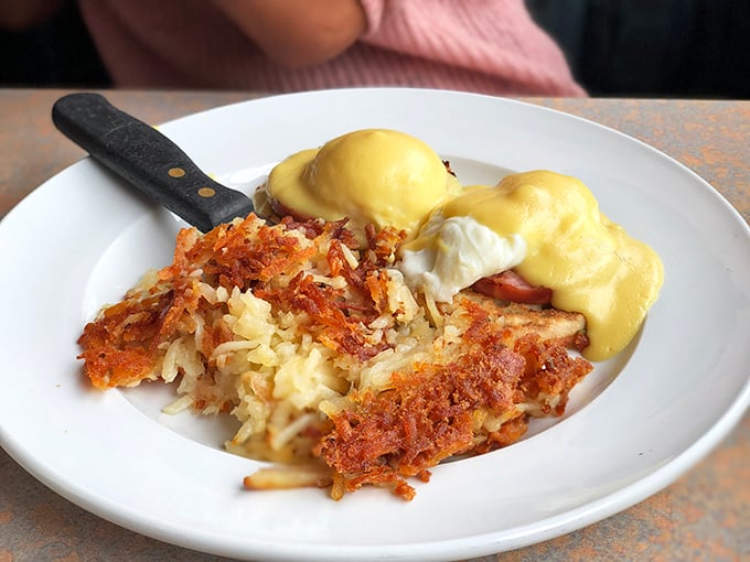Eggs Benedict with crispy home fries – a dish so perfectly executed it deserves its own Pennsylvania state holiday.