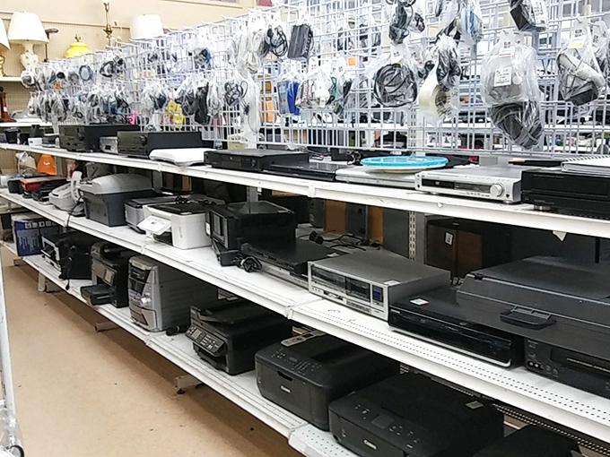 The electronics section—a time capsule of technological evolution where DVD players and stereo receivers await their next performance.