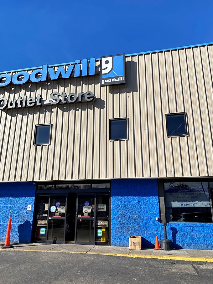 The bright blue entrance beckons bargain hunters like a retail Narnia—step through these doors and enter a world where $28 fills a cart.