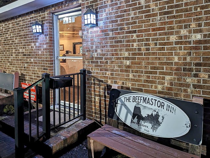 The entrance to meat paradise isn't grand—it's genuine. This doorway has welcomed generations of steak enthusiasts seeking beefy bliss.