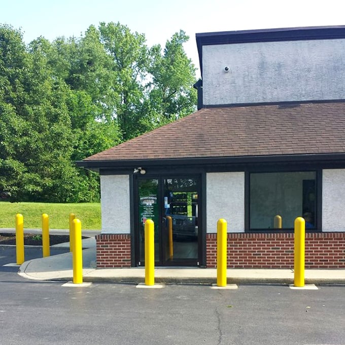 Those yellow bollards aren't just safety features—they're exclamation points announcing "Extraordinary Sandwiches Happen Here!" to passing motorists.