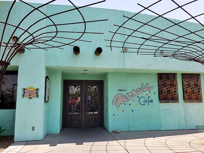 The entrance to Teresa's doesn't just welcome—it announces. Those metal sculptures aren't just decorative; they're sentinels guarding flavor paradise.