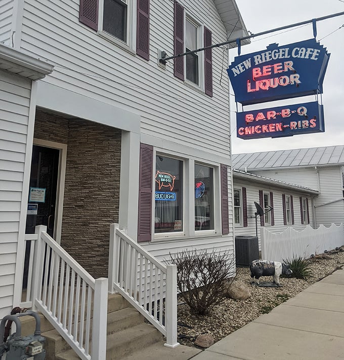 The entrance promises "BEER LIQUOR BAR-B-Q CHICKEN-RIBS" – five simple words that have been drawing hungry Ohioans down country roads for decades.