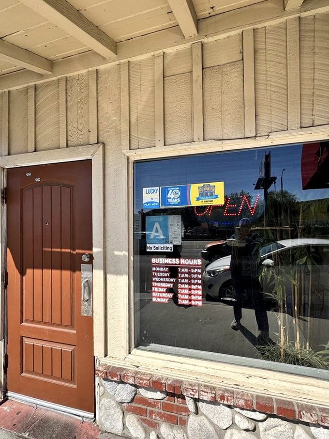 The welcoming entrance with posted hours promises consistent quality and the kind of reliability that builds devoted followings.