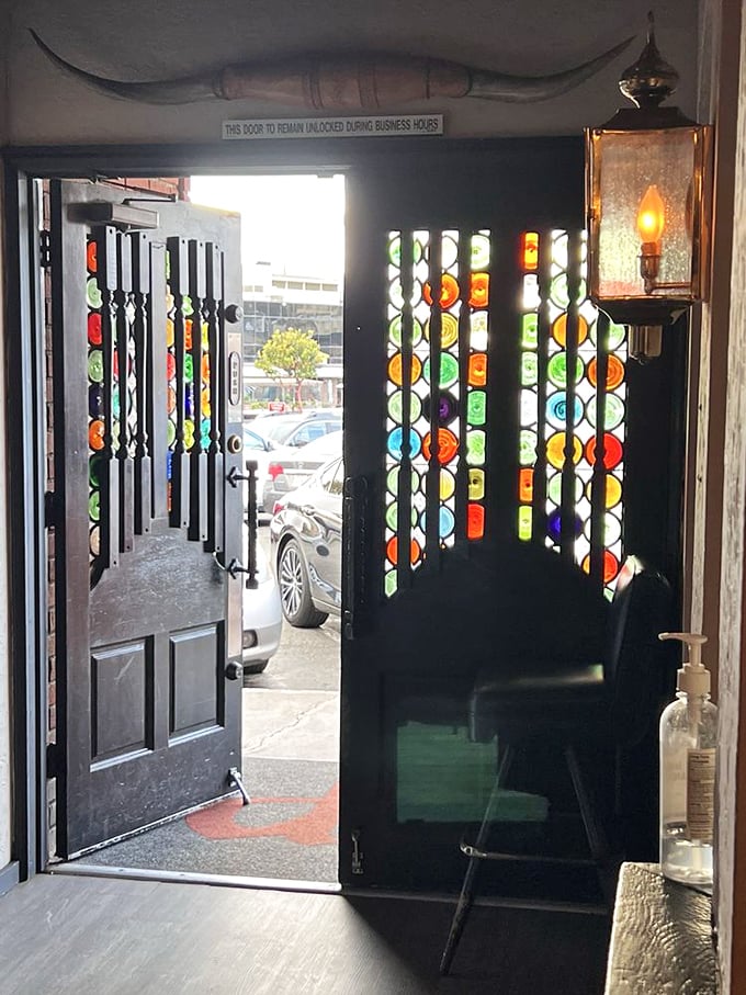 Stained glass details at the entrance hint at the timeless treasures waiting inside this neighborhood gem.