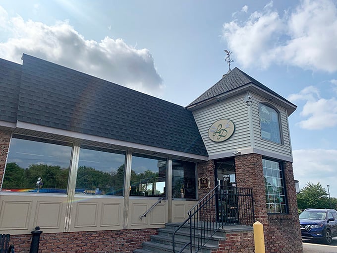 The entrance that promises pancake paradise awaits inside. That turret-style architectural feature says, "Yes, we take breakfast seriously around here."