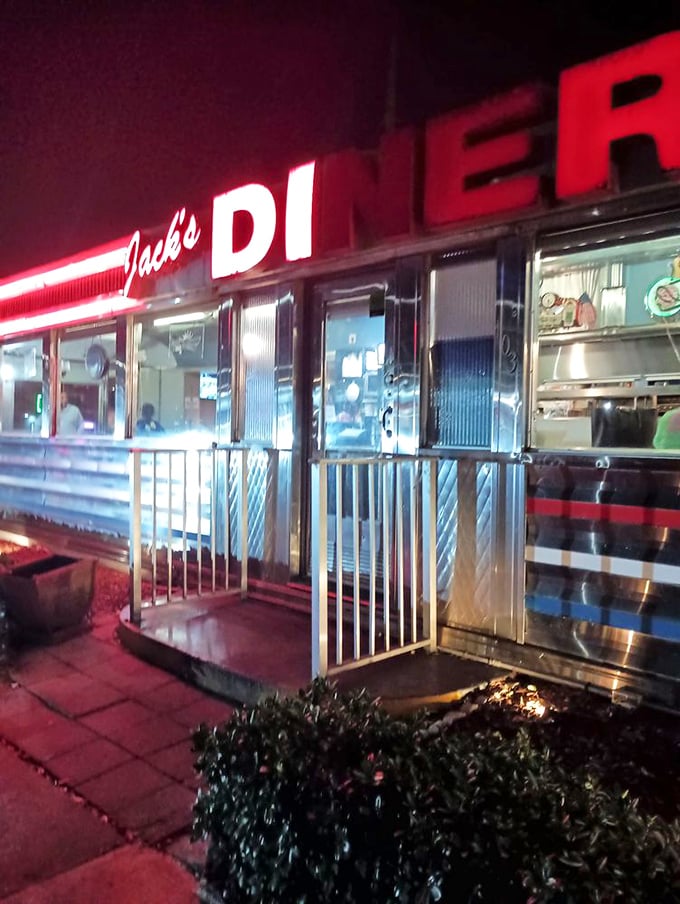 After dark, the neon glow of Jack's sign calls to night owls and early risers alike. Breakfast knows no clock here.