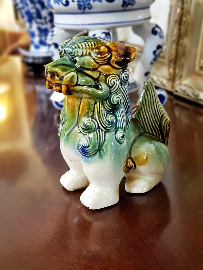 This glazed ceramic foo dog doesn't just guard your knickknacks—it brings a splash of mystical charm and history to any shelf.