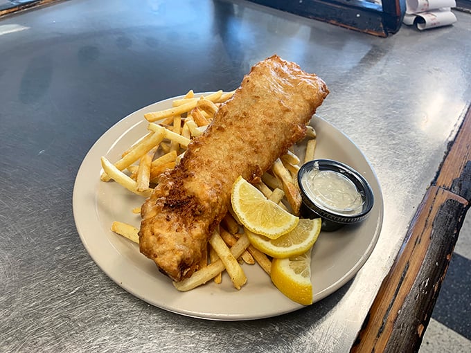 Fish and chips that would make the British jealous, with a golden batter so crisp you can hear it from across the diner.