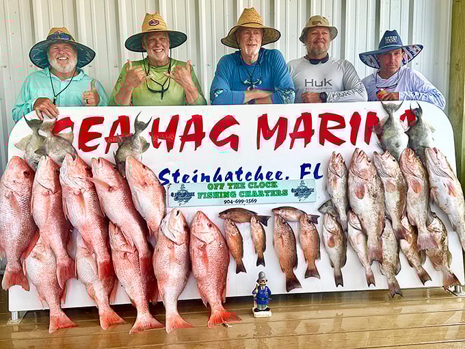 Proud anglers display their impressive catch—evidence that Steinhatchee's waters deliver on their promises of piscatorial abundance.