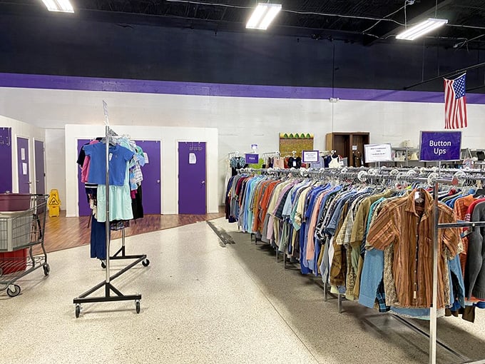 Purple doors mark fitting rooms like portals to alternate fashion dimensions—what goes in as "maybe" often emerges as "definitely." 
