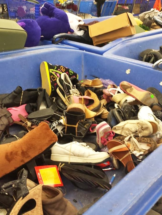 The footwear bin—a jumbled democracy where designer boots mingle with everyday sneakers. Your perfect pair is hiding somewhere in this chaos.