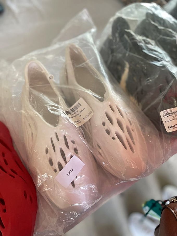 Even practical items like these packaged shoes become potential bargains in the flea market ecosystem, where yesterday's retail becomes today's steal.