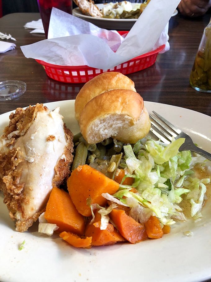 Fried chicken with sides that don't play second fiddle—each component on this plate deserves its own standing ovation.