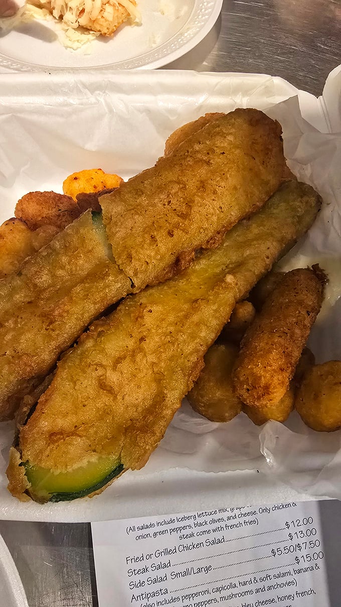Fried pickles and zucchini that achieve the perfect textural contrast – a crunchy exterior giving way to a juicy, flavorful center.