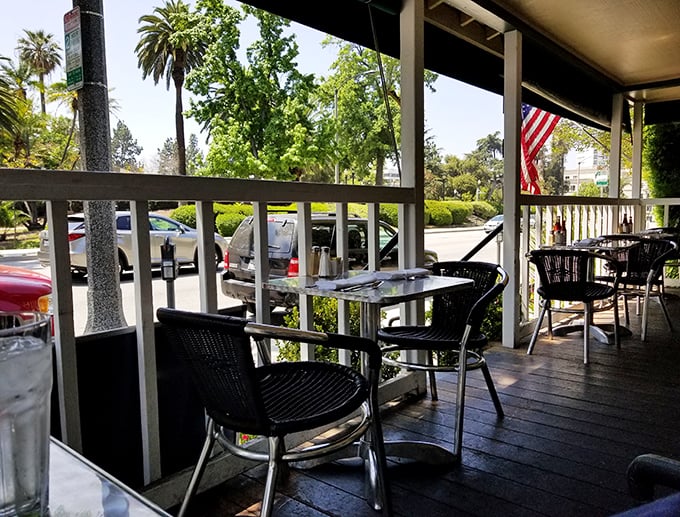 Front porch seating channels peak California living—palm trees in view while you contemplate whether to order sweet or savory.
