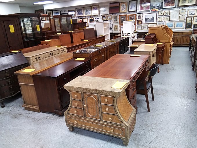 Desk paradise for the home office hunter. That curved secretary desk has witnessed more letter-writing than your email account ever will.